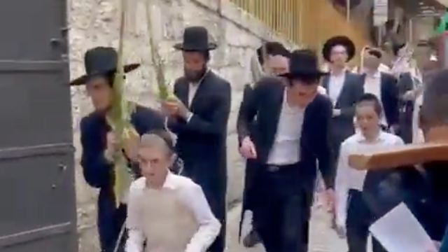 Five arrested after strictly Orthodox Jews filmed spitting at ...