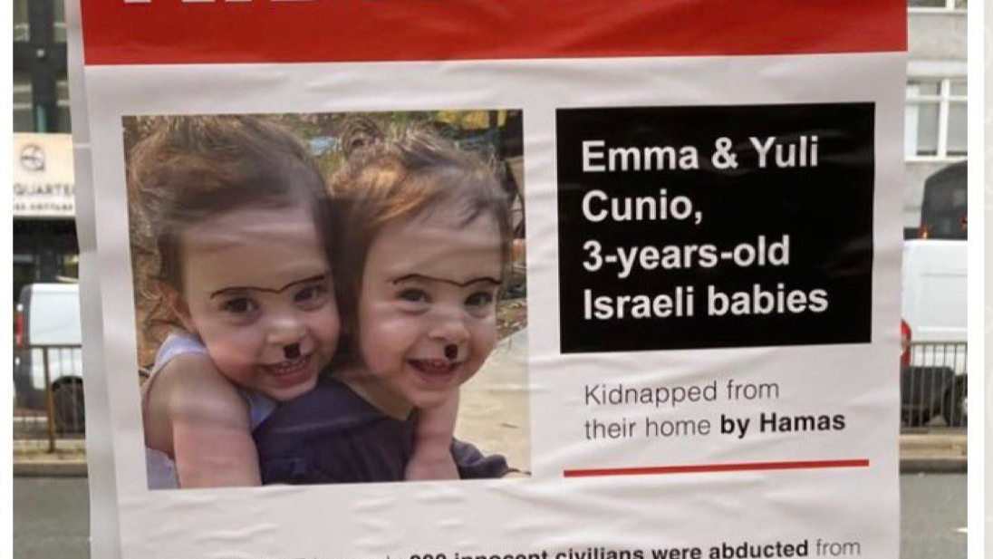 Israel terror: Poster of Israeli twin girls kidnapped by Hamas defaced ...