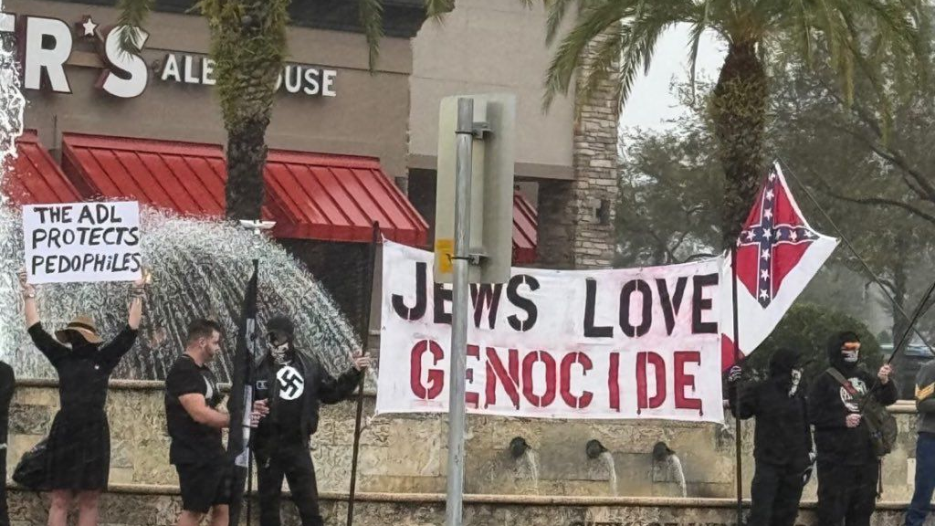 Neo-Nazis holding sign saying ‘Jews love genocide’ protest in Florida ...